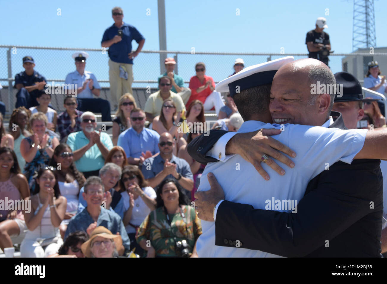 CAPE MAY, N.J. - Secretary of Homeland Security Jeh Johnson hugs his ...