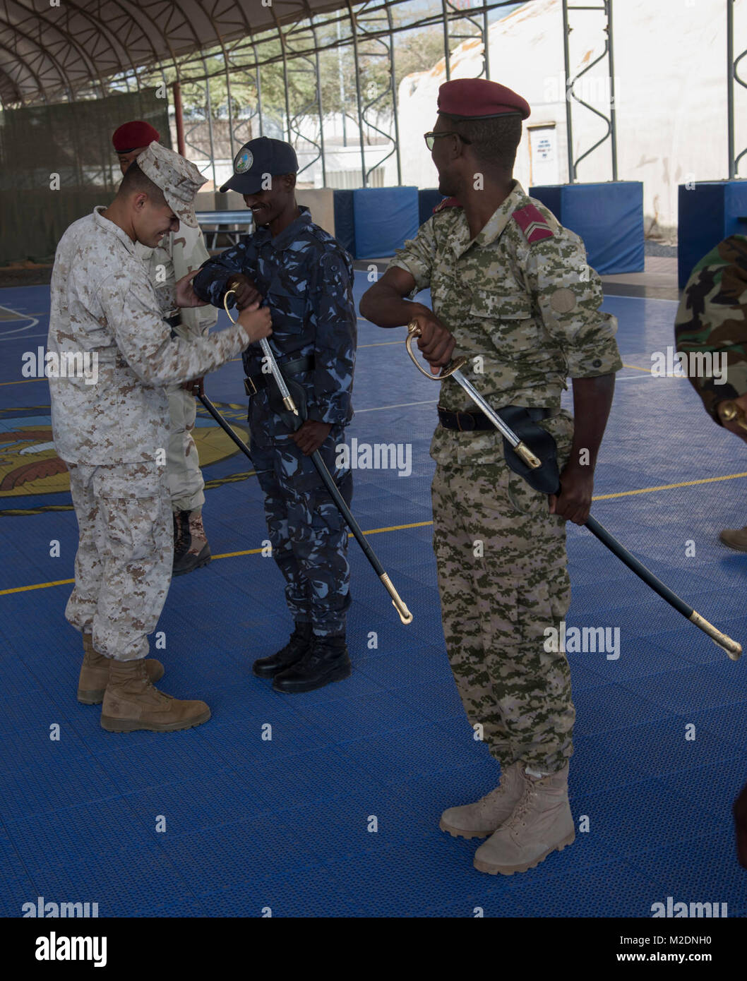 U.S. Marine Corps Sgt. Raymundo Rodriguez shows a Djiboutian military ...