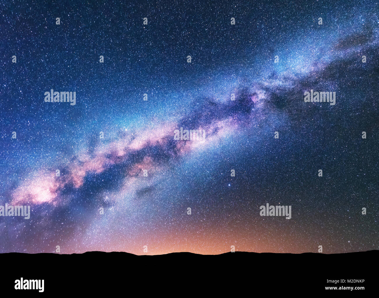 Milky Way. Fantastic night landscape with purple milky way, sky full of ...