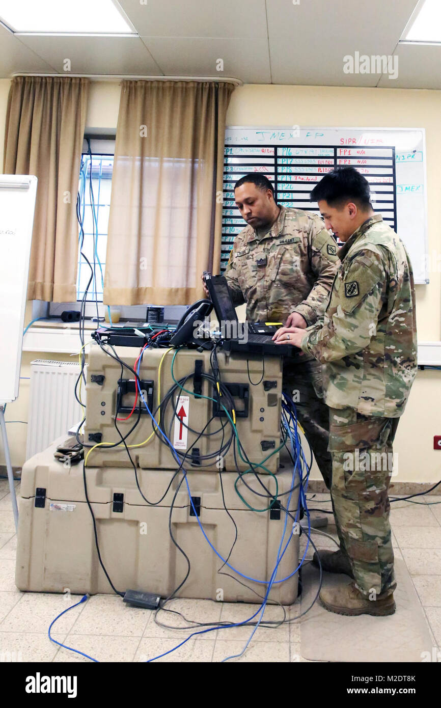 U.S. Army Cpl. Marvin Carson and Sgt. John Delgado, assigned to Charlie ...