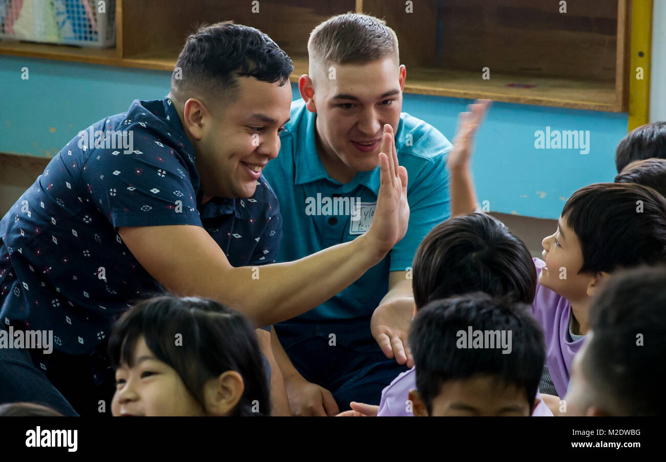 U.S. Marine Corps Lance Cpl. Headley Hall (left) and Petty Officer 3rd ...