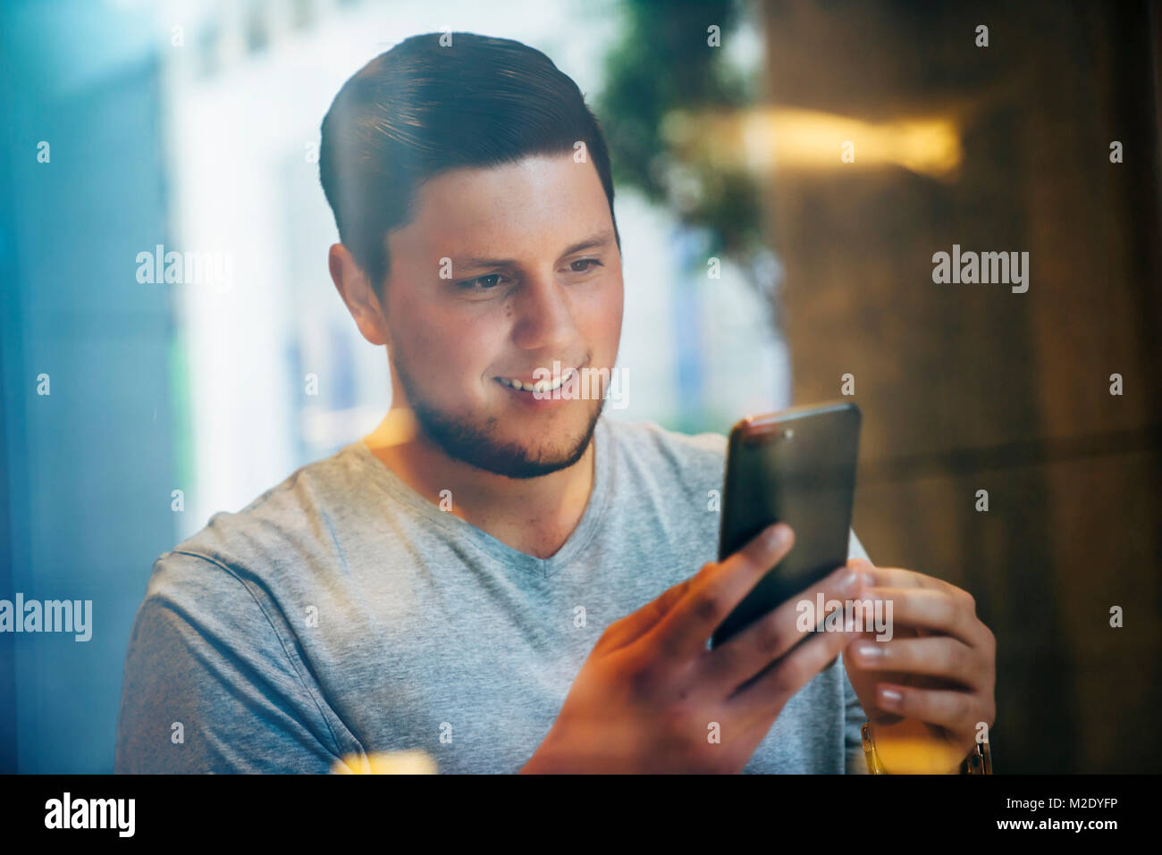 Smiling millennial european man hi-res stock photography and images - Alamy