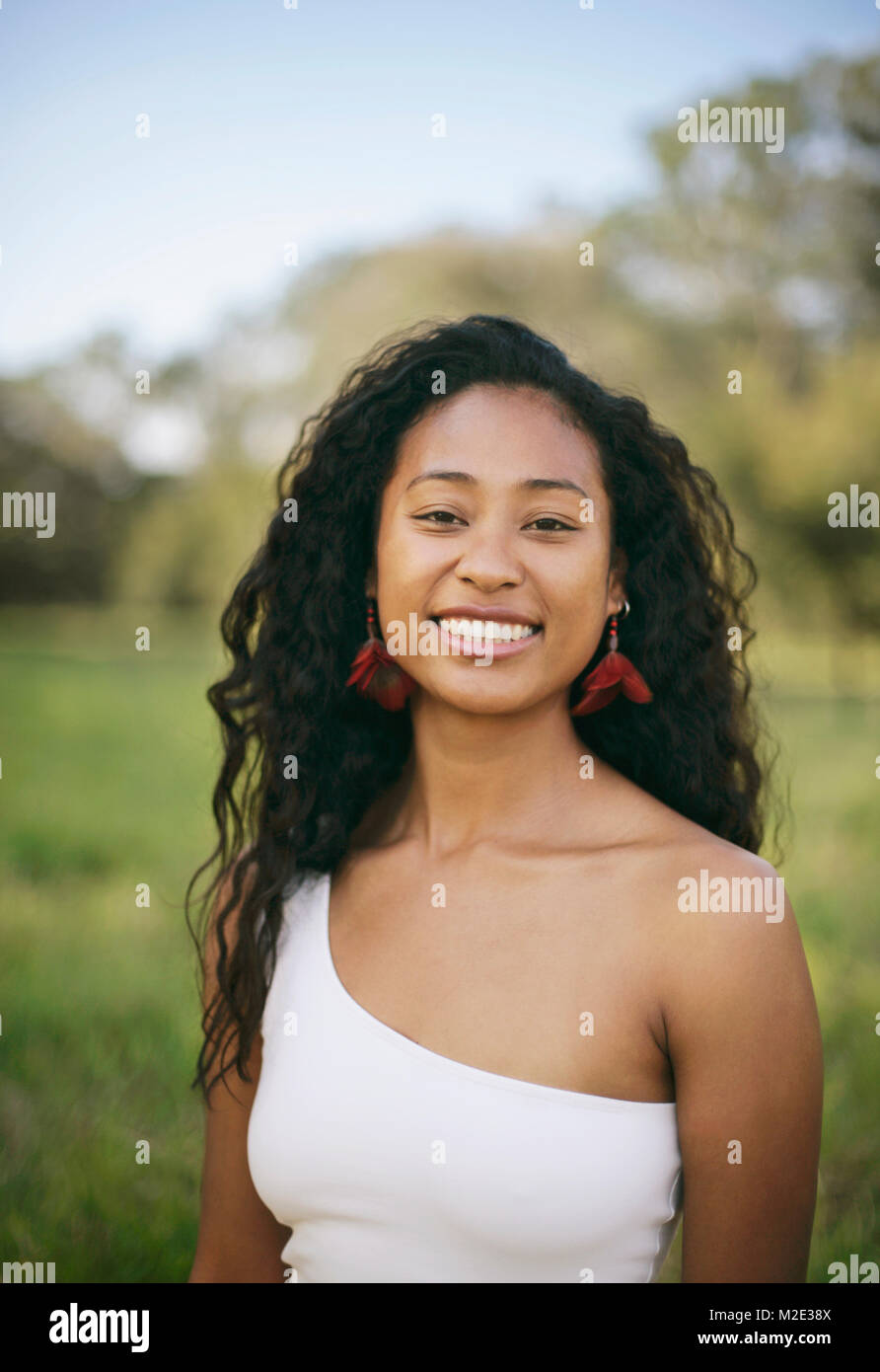 Portrait of smiling mixed race woman Stock Photo - Alamy Portrait of smiling mixed race woman Stock Photo - Alamy