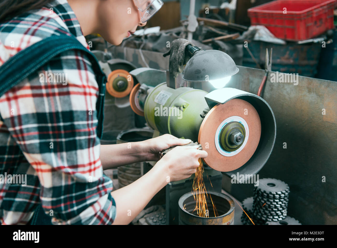young professional female milling machine company employee wearing ...