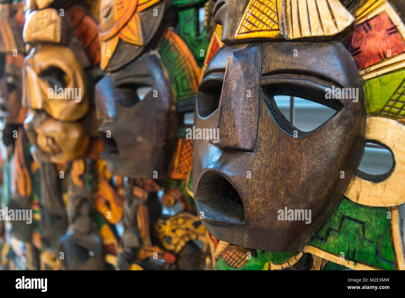 traditional mayan hand carved masked on display in Mexico Stock Photo ...