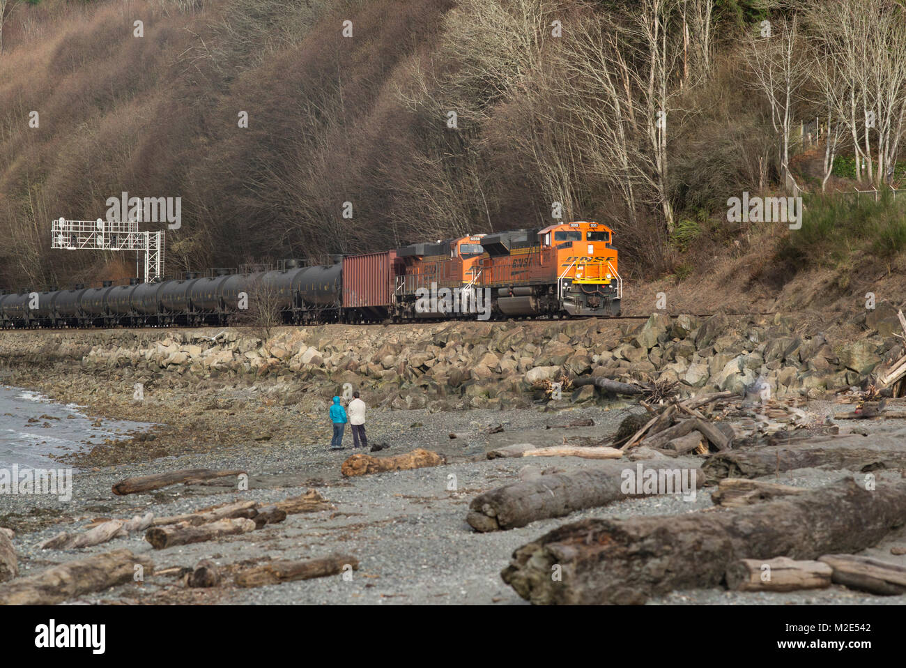 Watching oncoming freight train, Seattle, Washington, USA Stock Photo ...