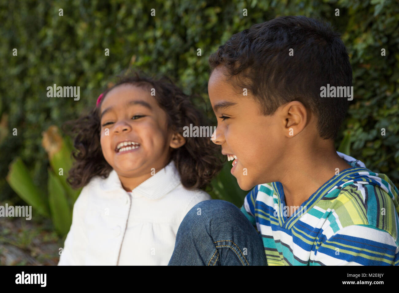 Hispanic brother and sister Stock Photo - Alamy