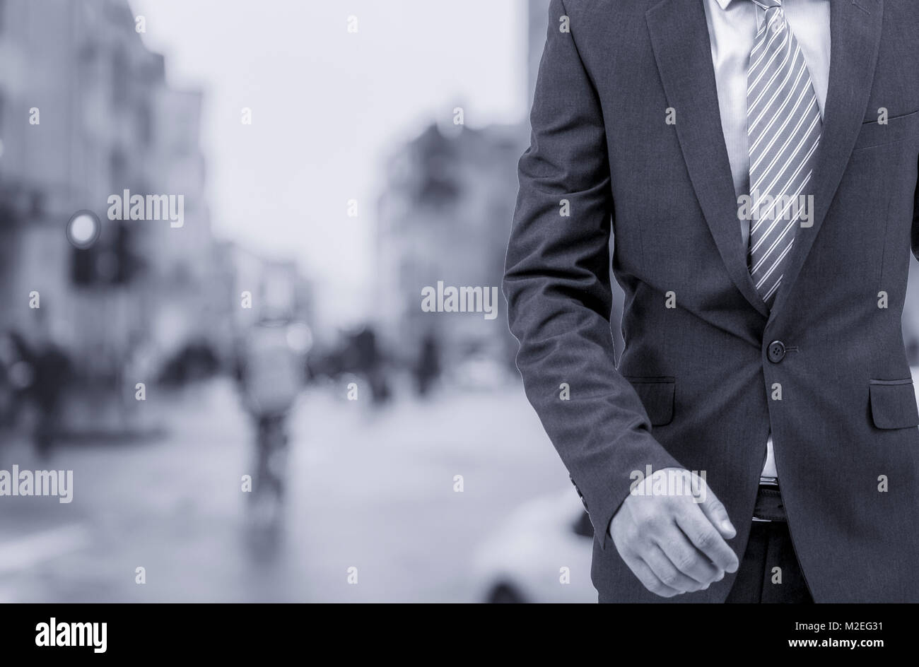 isolated business man on the street, london, UK Stock Photo - Alamy
