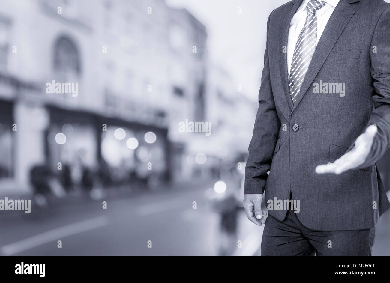 isolated business man on the street, london, UK Stock Photo - Alamy
