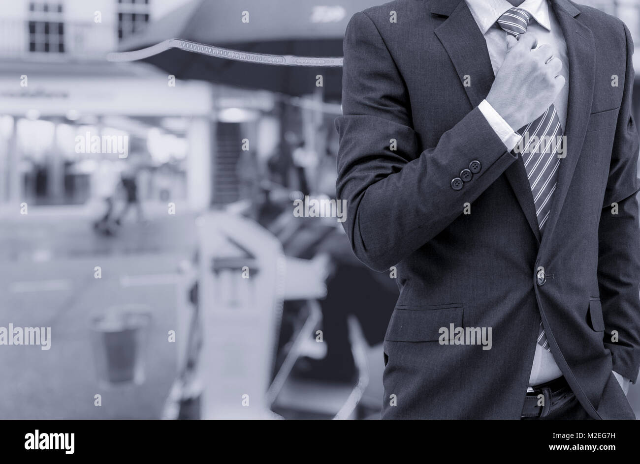 isolated business man on the street, london, UK Stock Photo - Alamy