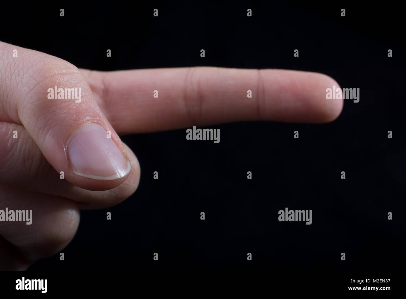 Hand pointing gesture on a white background Stock Photo - Alamy