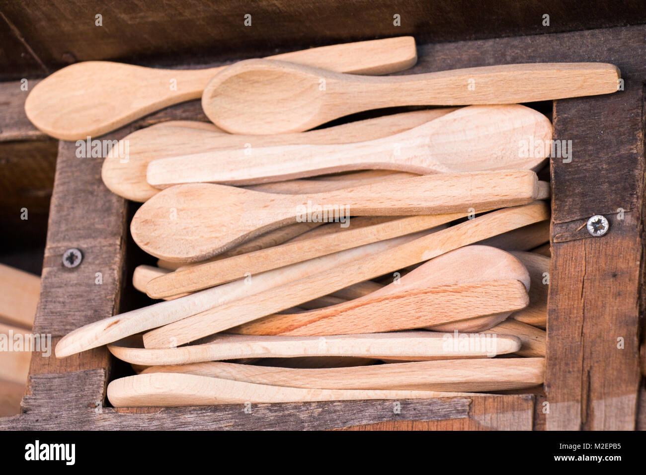dozens of soup spoon or tablespoon made of wood Stock Photo - Alamy