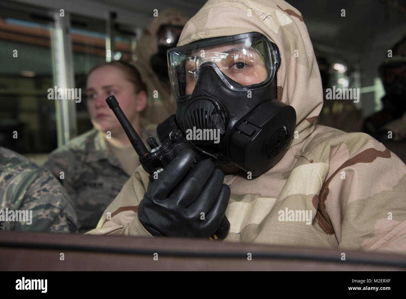 An Airman from the 60th Air Mobility Wing, wearing mission oriented ...