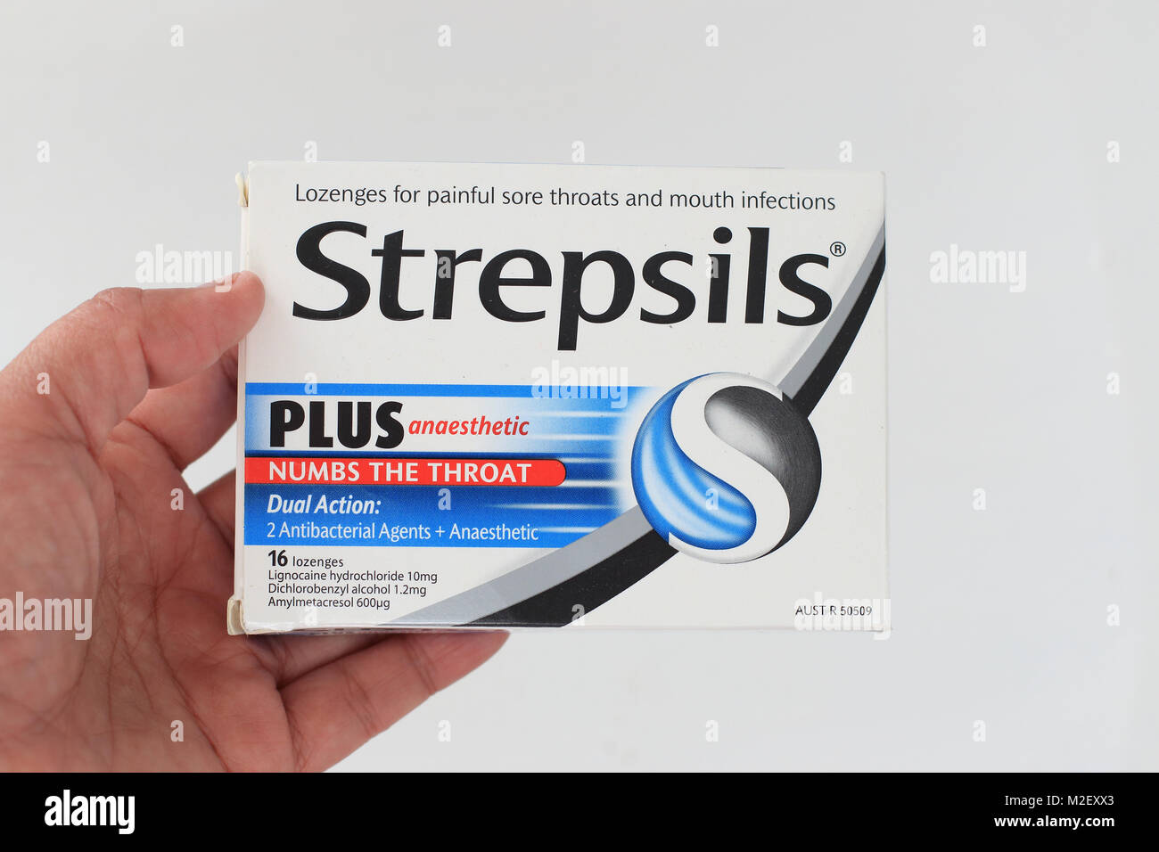 Strepsils - throat lozenges numbing the throat for sore throat isolated ...