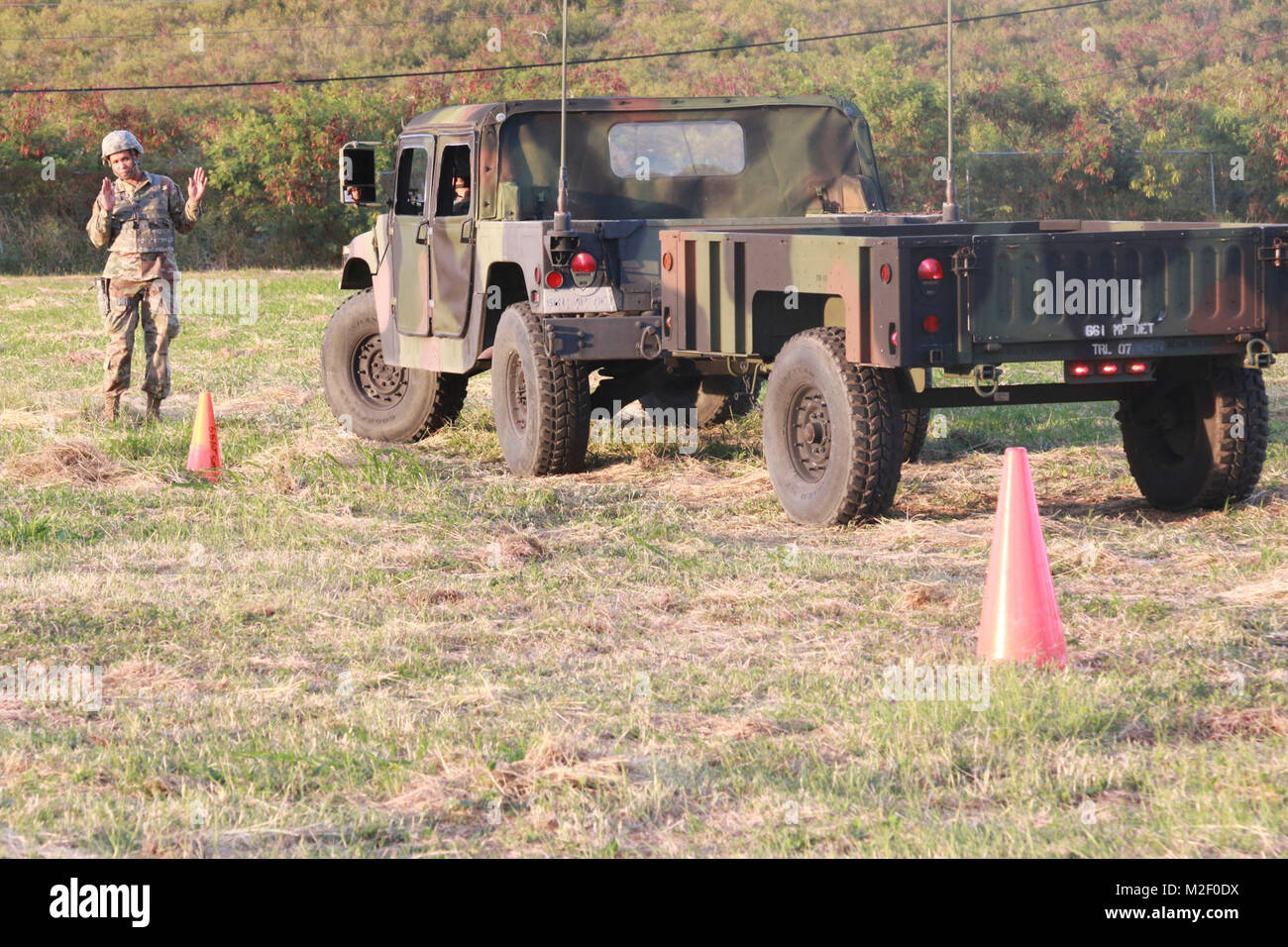 Spc. Karima Liburd and Pfc. Elliot Navarro, military police, of the ...