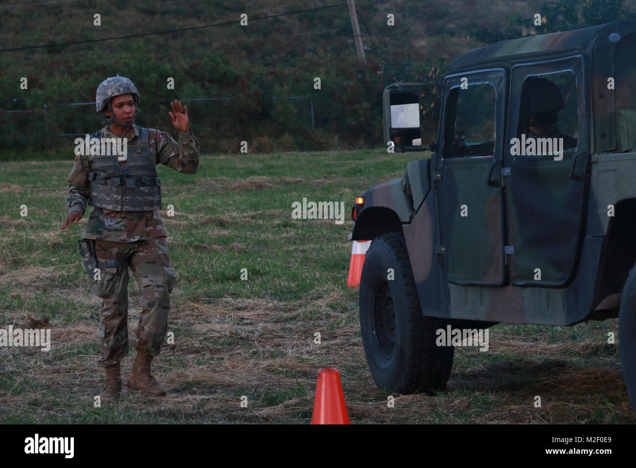 Spc. Karima Liburd and Pfc. Elliot Navarro, military police, of the ...