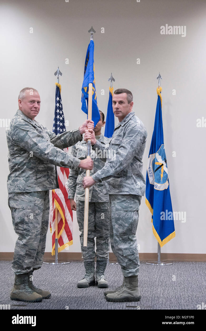 Col. Robert Stanton, 403rd Wing vice commander, passes the 403rd ...
