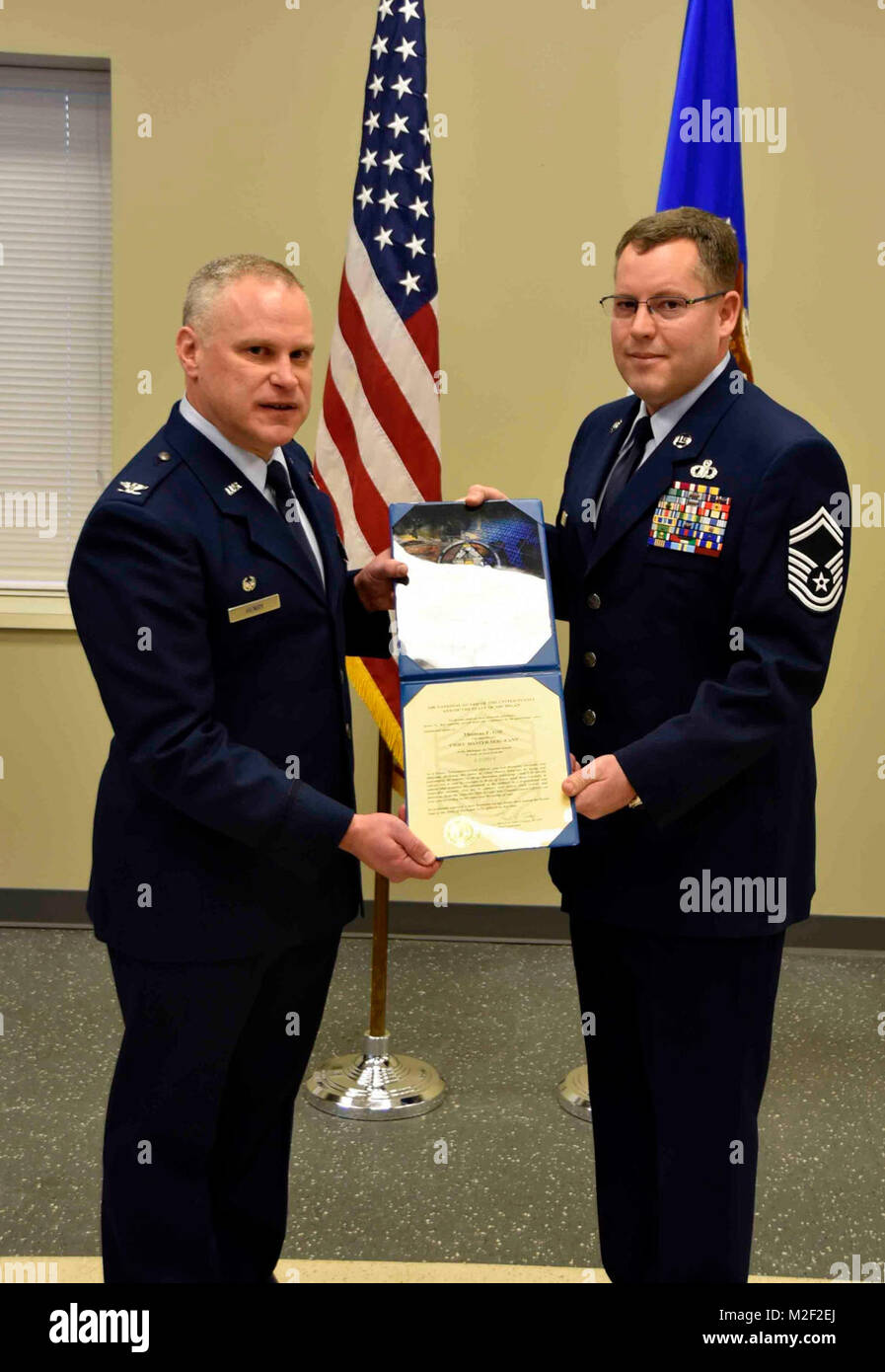 Col. Donald Henry promoted Senior Master Sgt. Thomas Gill Jr. to the ...