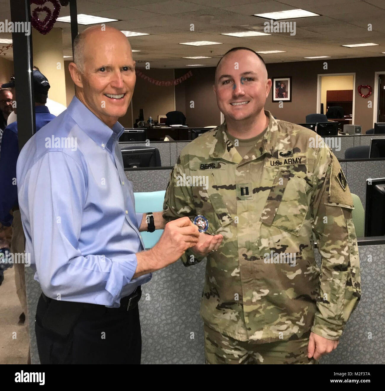 SAN JUAN, Puerto Rico –Florida Governor Rick Scott presents a Coin of ...