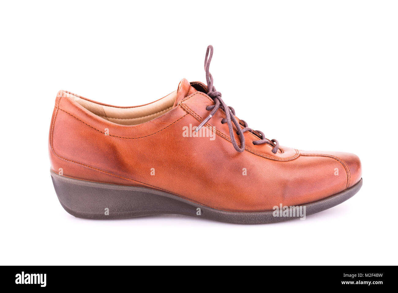 Brown shoe isolated on white background Stock Photo - Alamy