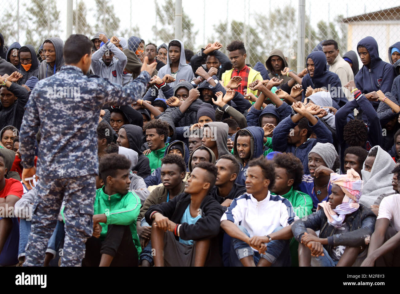 Gharyan, Libya. 2nd Feb, 2018. Illegal immigrants raise their hands ...