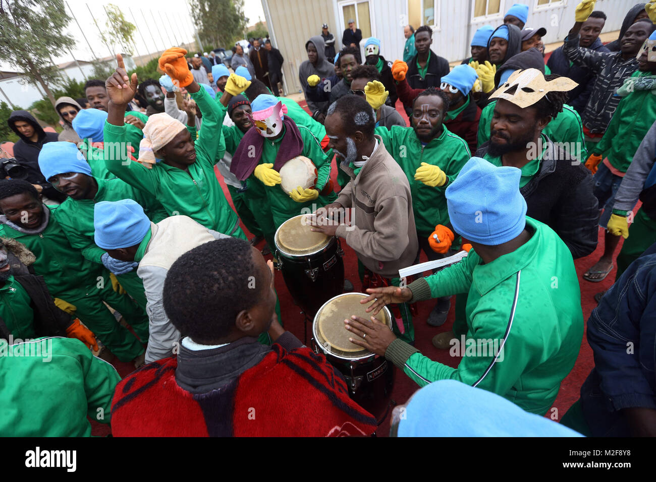Gharyan, Libya. 2nd Feb, 2018. Illegal immigrants dance and sing to ...