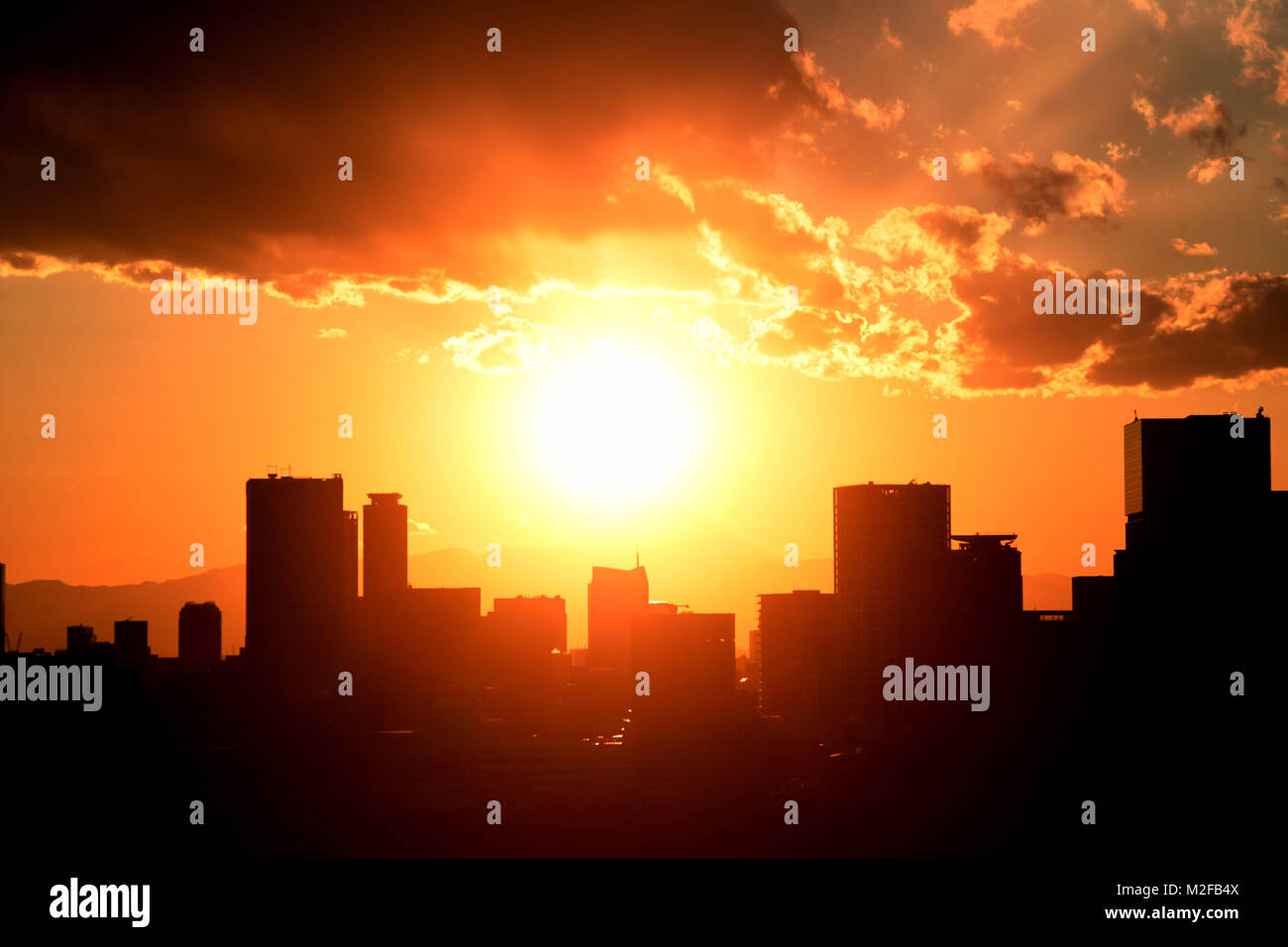 Tokyo, Japan. 06th Feb, 2018. The sun setting behind mount Fuji, which ...