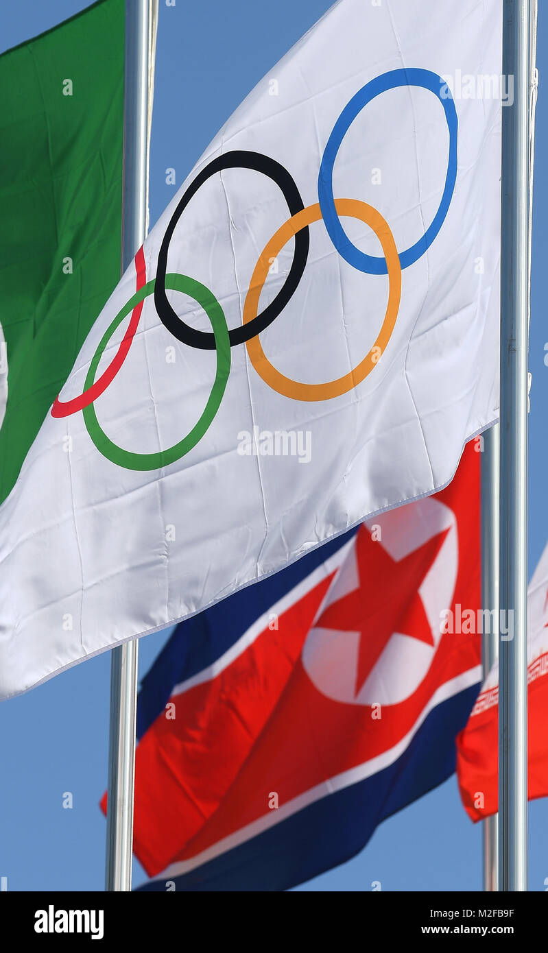 Pyeongchang, South Korea. 07th Jan, 2018. The Olympic flag (above) and ...