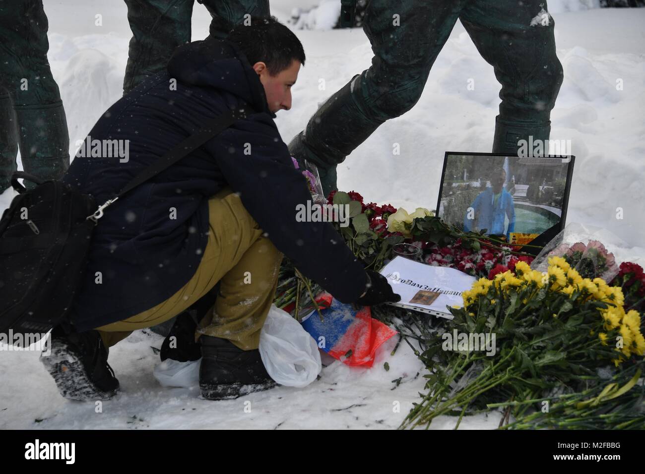 Moscow. Russia. February 6, 2018. People lay flowers near the Russian ...