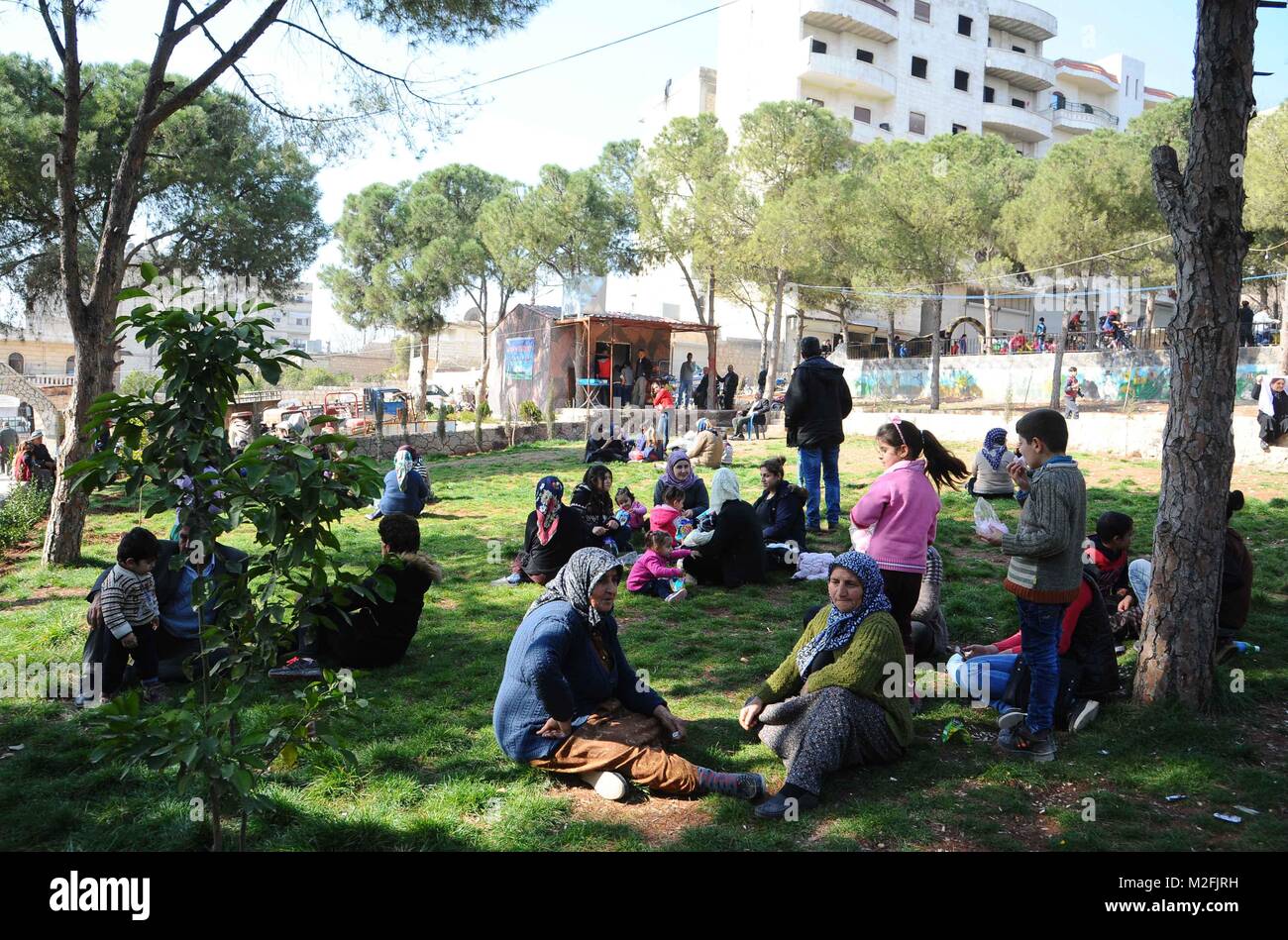 Afrin, Syria. 7th Feb, 2018. Displaced Syrian Kurdish families spend ...
