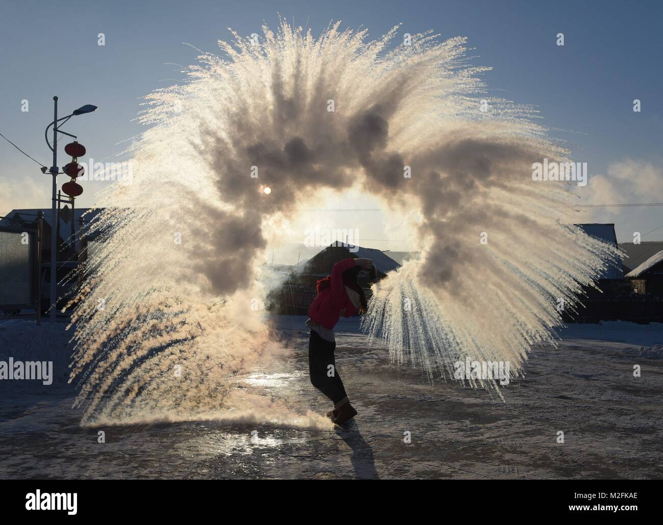 Hot water freezing in air hi-res stock photography and images - Alamy