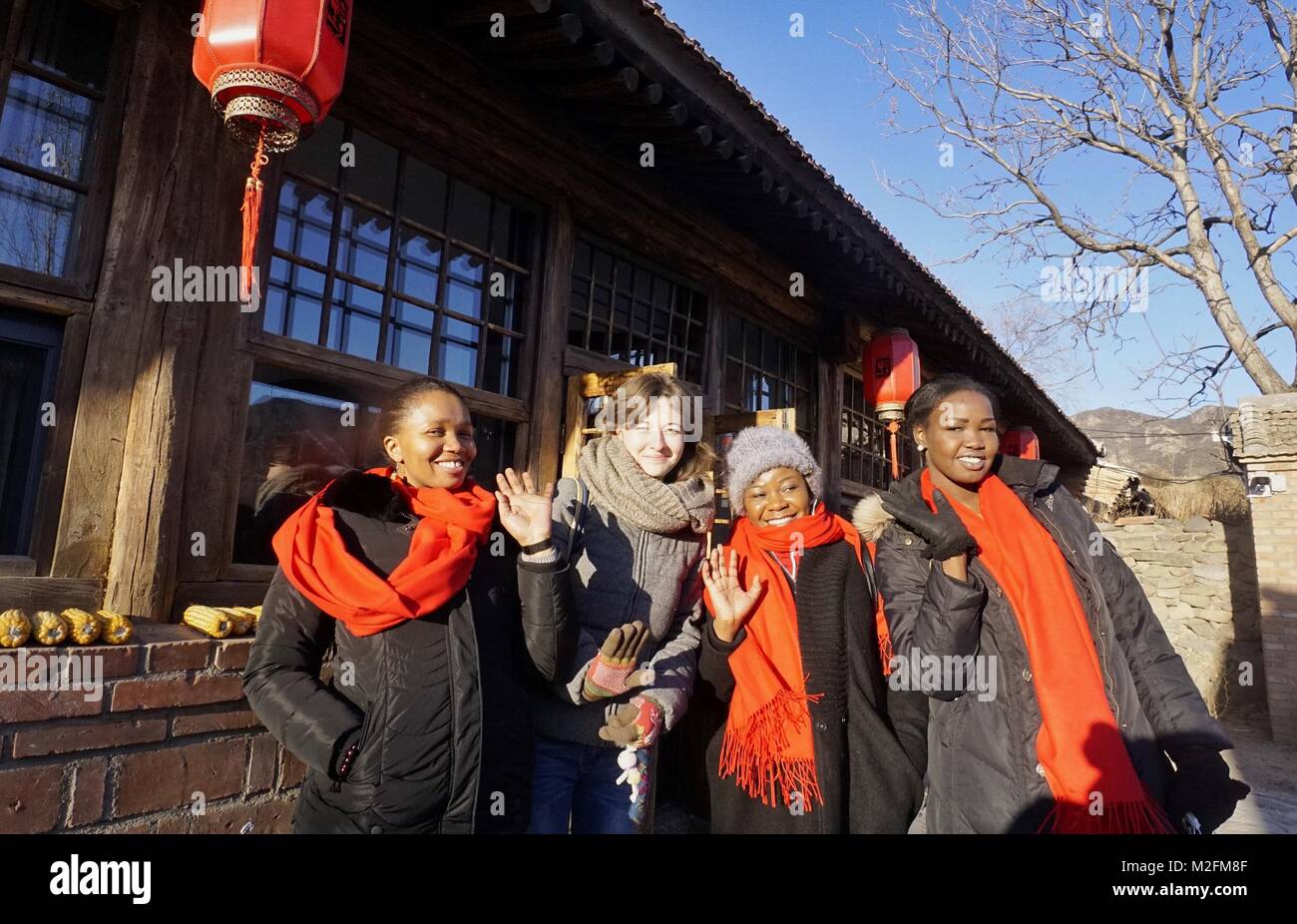 Beijing, Beijing, China. 7th Feb, 2018. Foreigners pose for a photo ...