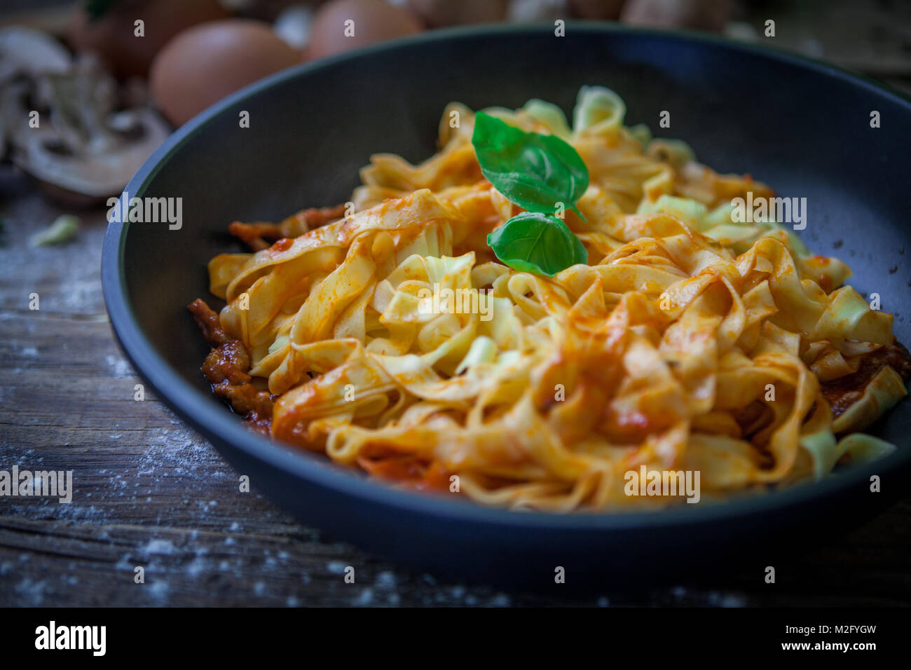 Fresh egg tagliatelle italian homemade pasta with bolognese sauce Stock ...