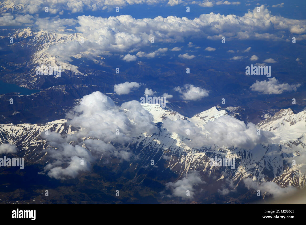 Aerial view snow mountain from window of airplane Stock Photo - Alamy Aerial view snow mountain from window of airplane Stock Photo - Alamy