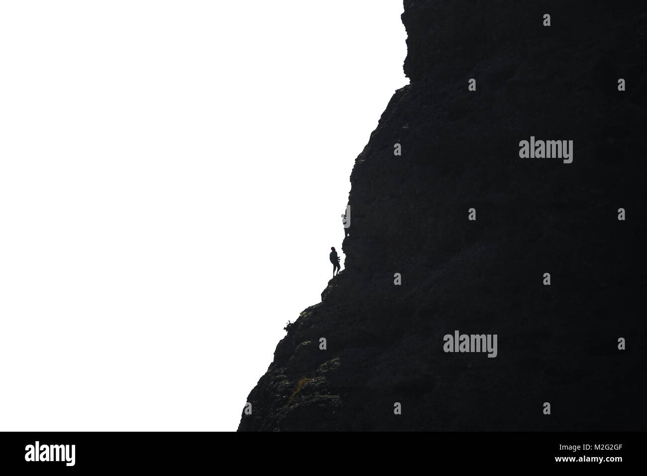 Man hanging on the edge of the cliff hi-res stock photography and ...