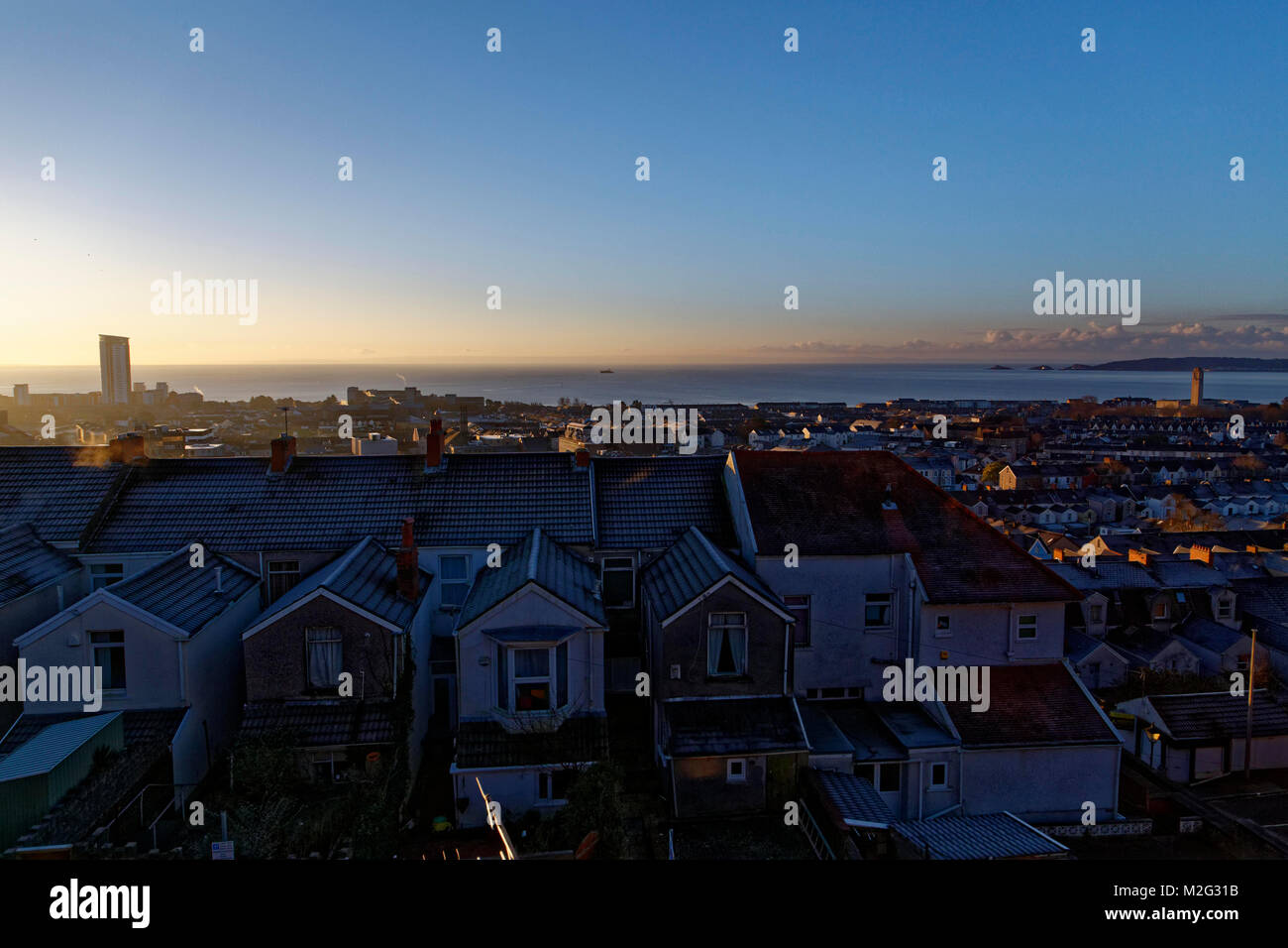 WEATHER WALES The sun rises over frosted roof tops during a frosty ...
