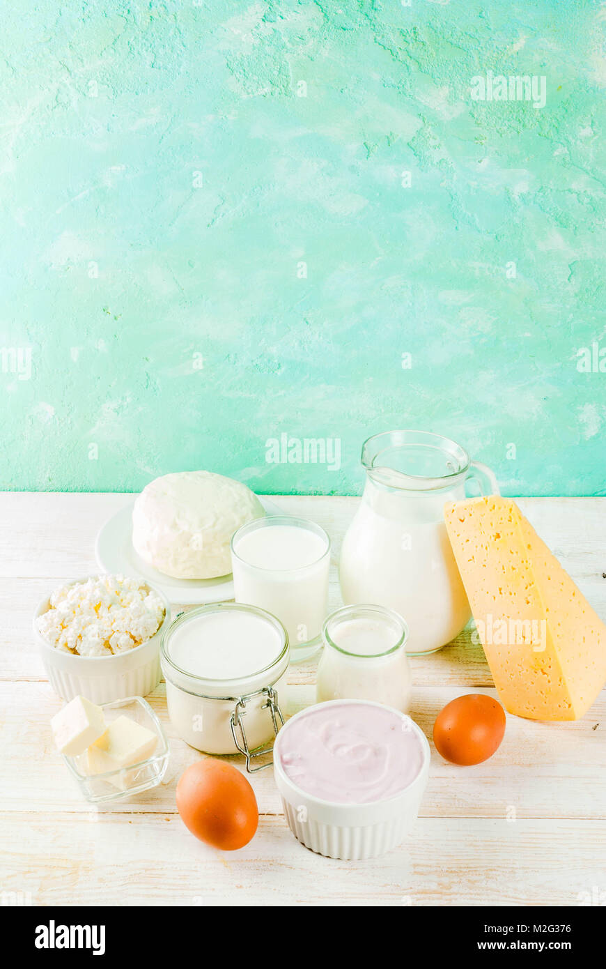 Healthy food concept. Set of dairy products light blue background copy ...
