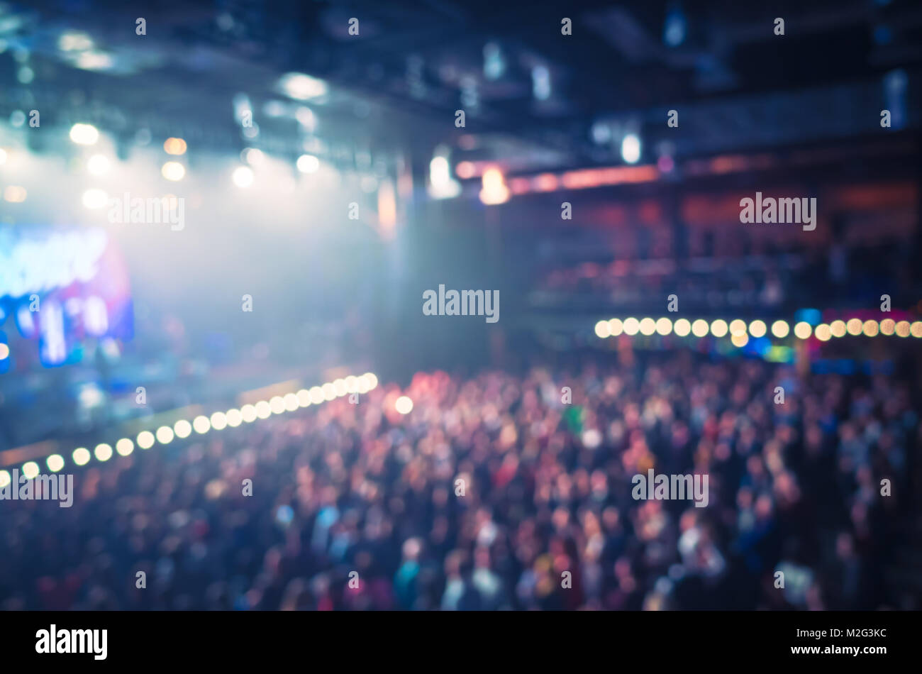 Blurred photo background, life music concert hall with colorful ...