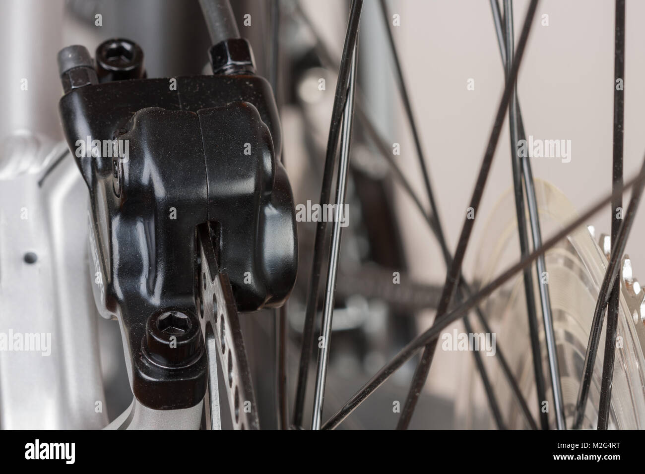 Hydraulic rear disc brake of mountain bike, close up view, studio photo ...