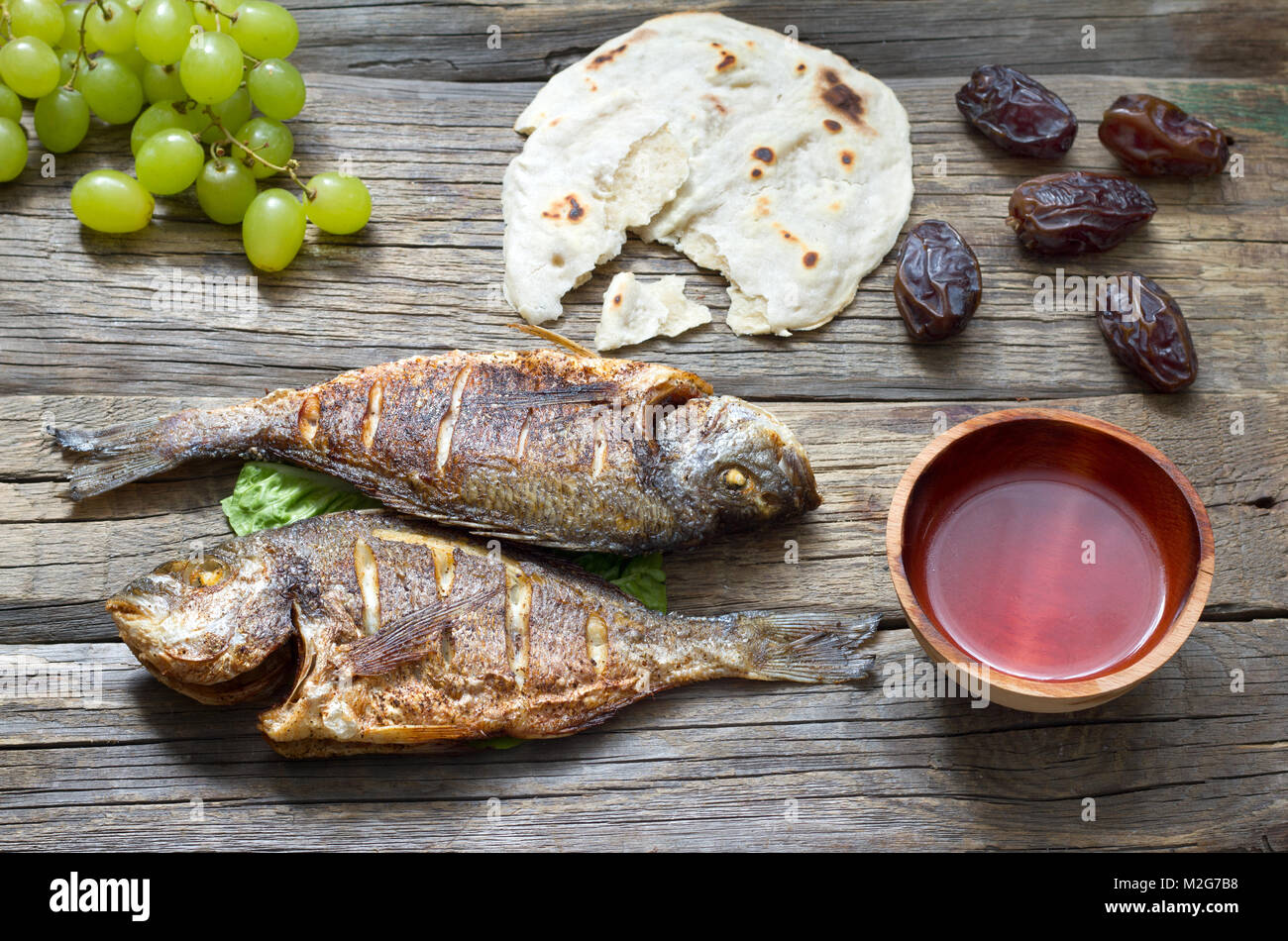Easter food with fish passover bread cross in goblet of wine last ...