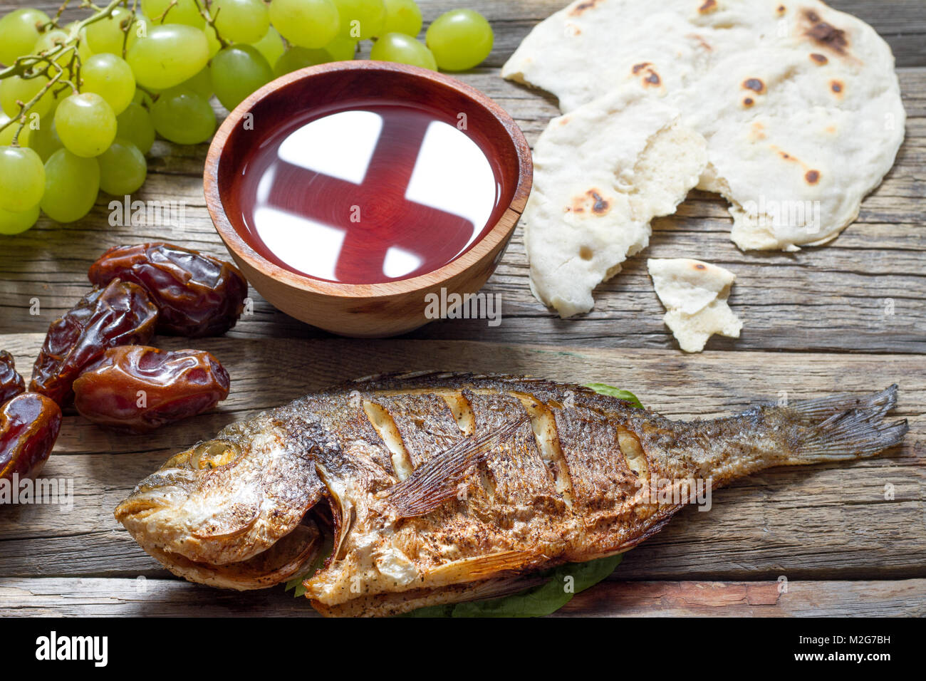 Easter food with fish passover bread cross in goblet of wine last ...