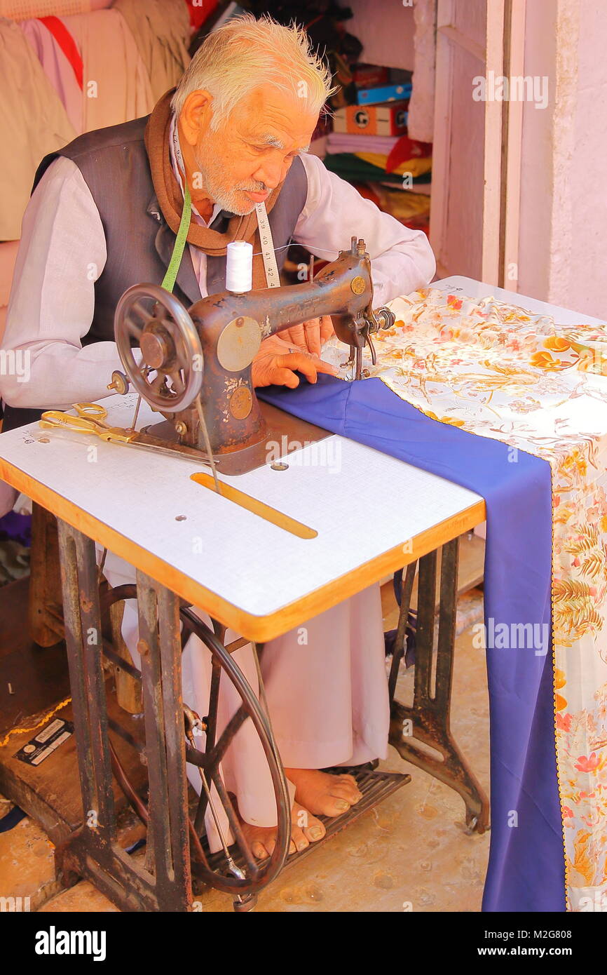 Tailor old man sewing hi-res stock photography and images - Alamy