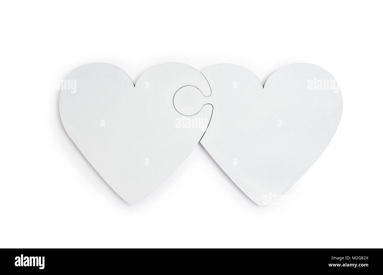 Two hearts puzzle on isolated clipping mask on white background, top ...