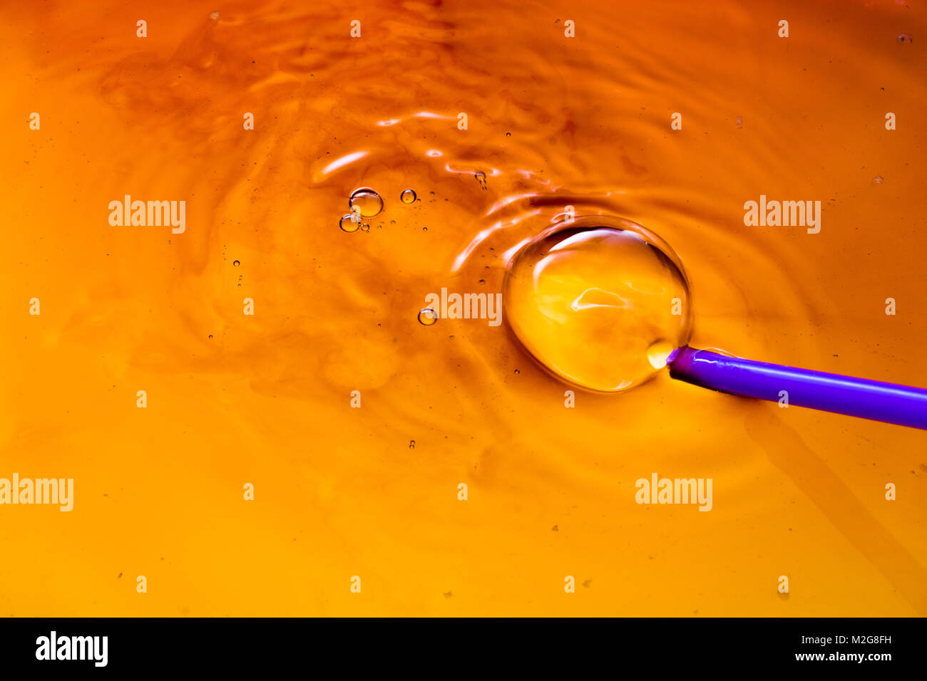 Colorful water bubles on water as abackground Stock Photo - Alamy