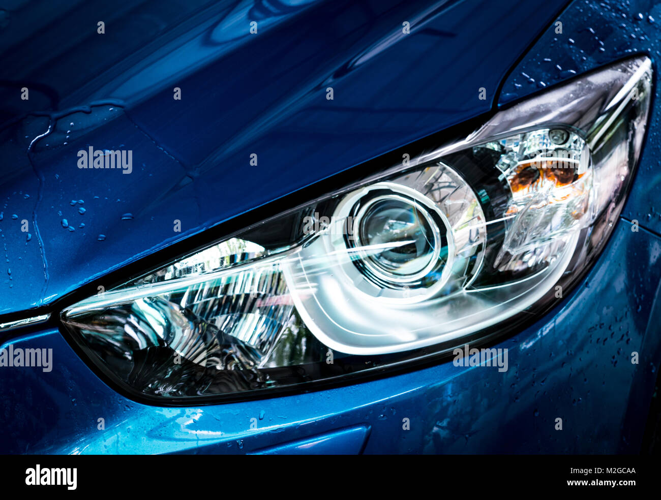 Blue compact SUV car with sport and modern design are washing with ...