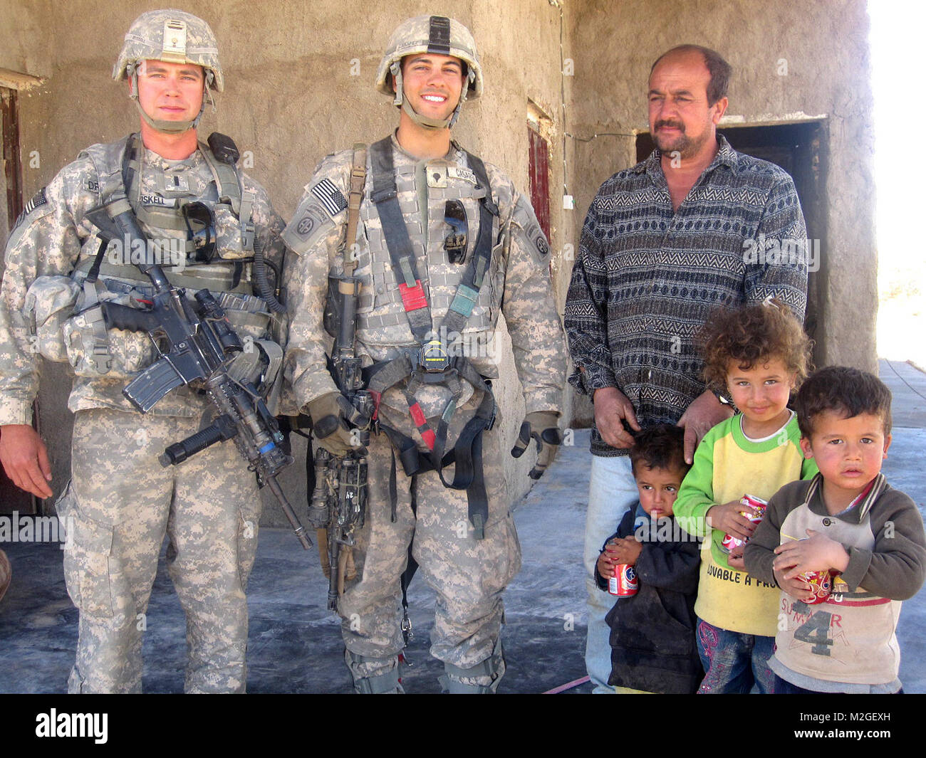 First Lt. Joseph Driskell, platoon leader, and Spc. Erik Casarez, and ...