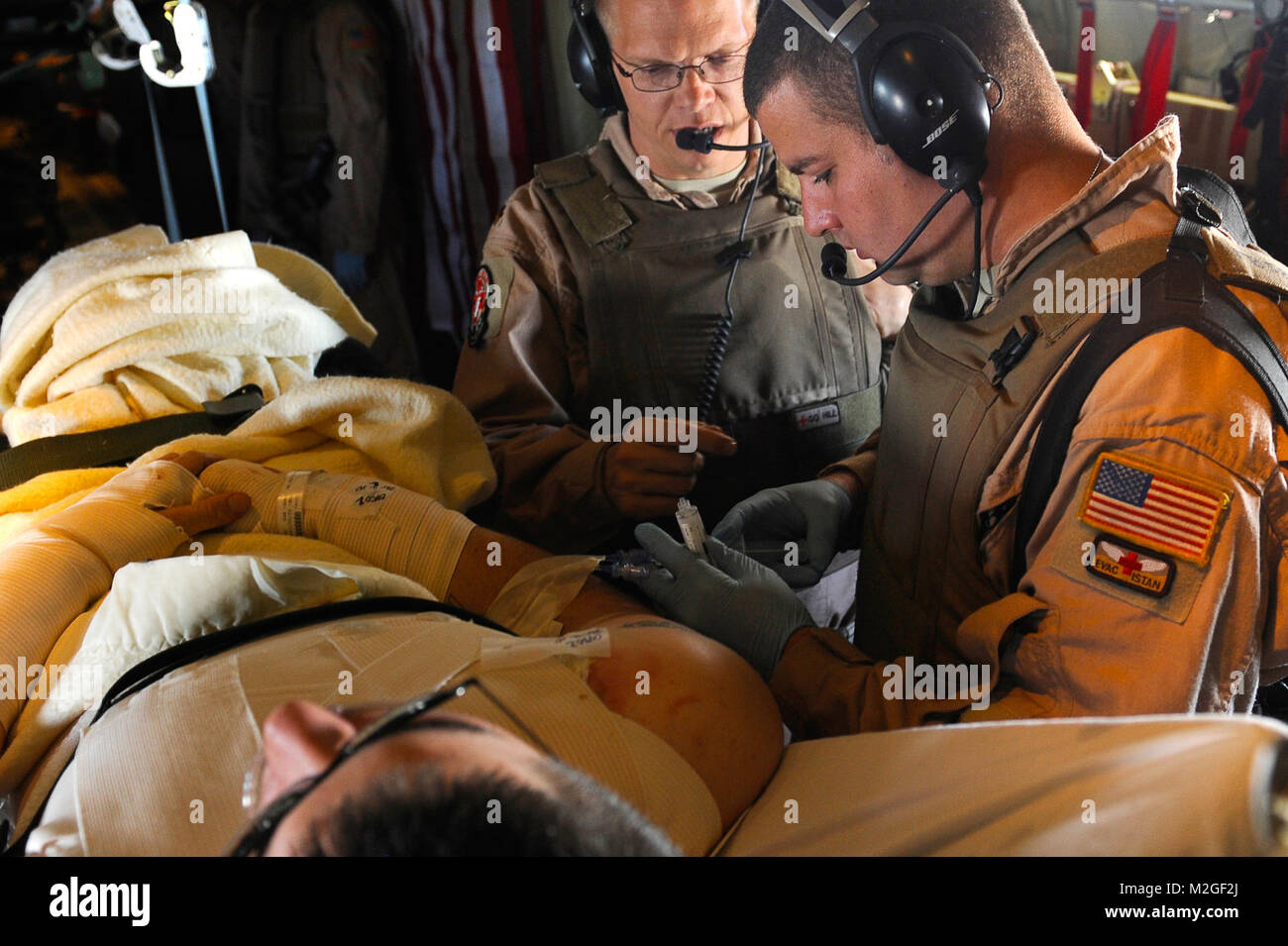 U.S. Air Force Maj. Richard Foote (left) and Tech. Sgt. Chris Hines ...