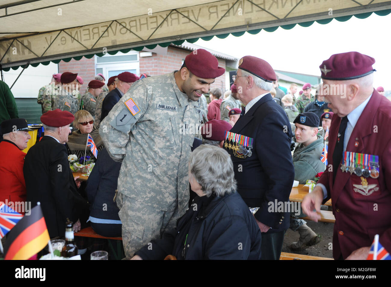 5th QM commander talks with retired British paratrooper who took part ...