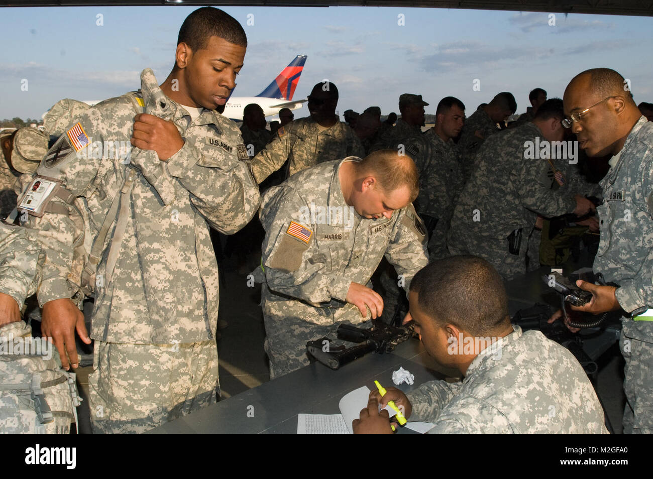 Soldiers check in their weapons by Georgia National Guard Stock Photo ...