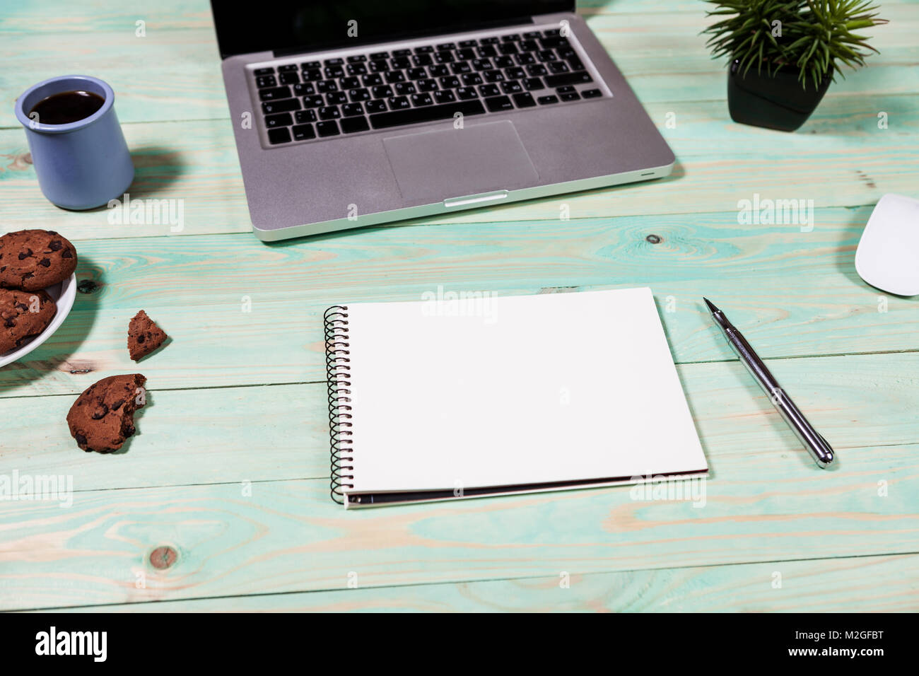 Blue office desk table with with office supplies. Top view with copy ...